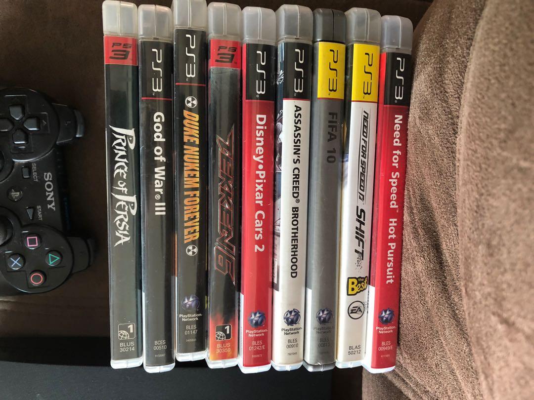 Sony PS3 + 2 DualShock Controllers + games, Video Gaming, Gaming ...