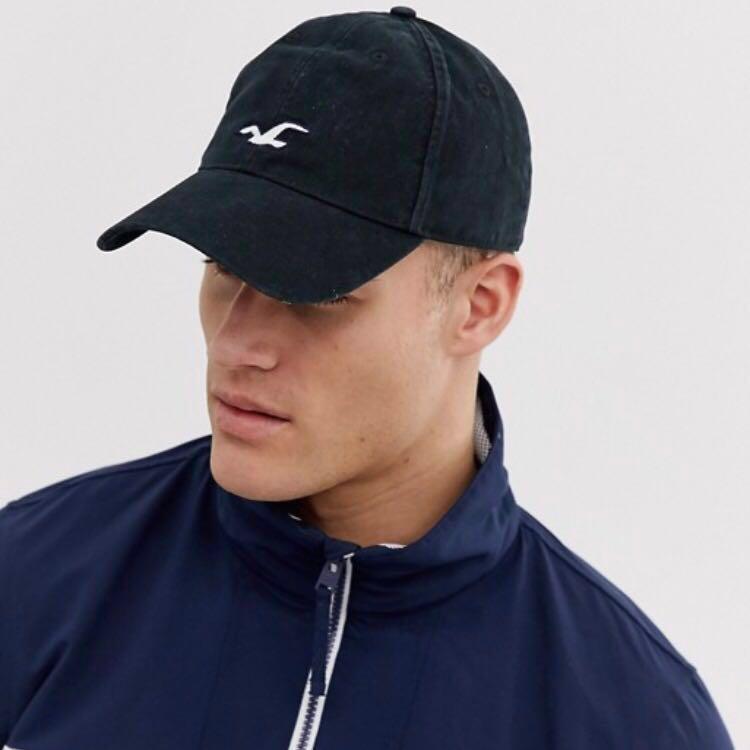 Hollister icon logo dad baseball cap in black, Men's Fashion, Watches ...