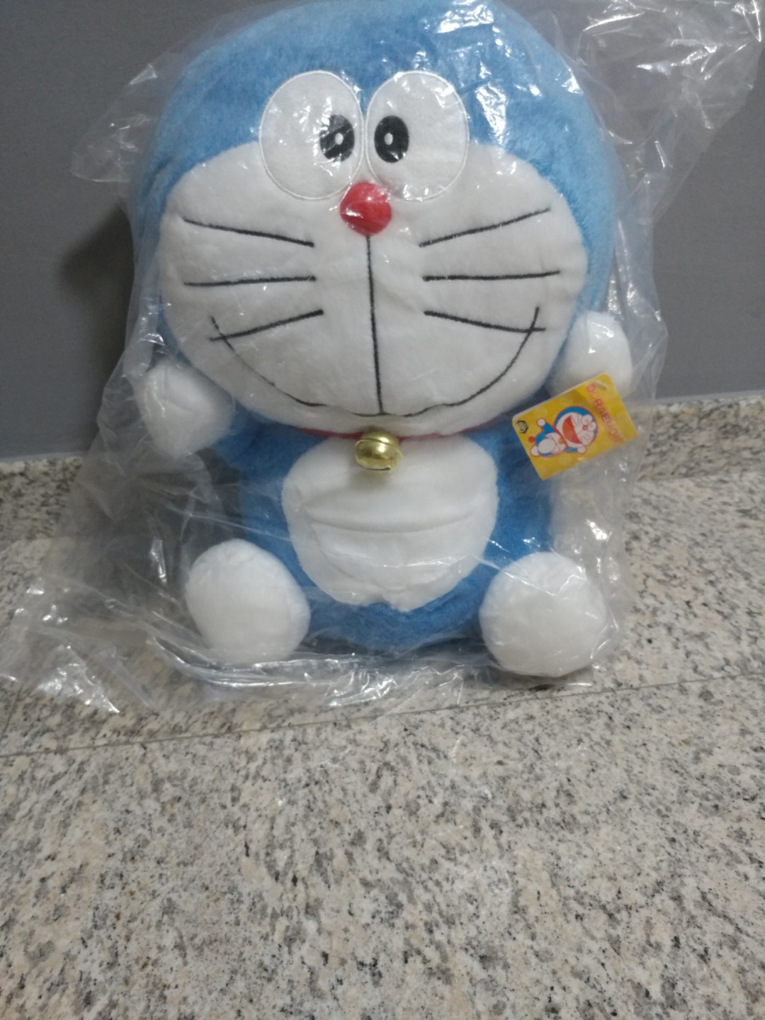 Doraemon plush with metal bell, Hobbies & Toys, Toys & Games on Carousell