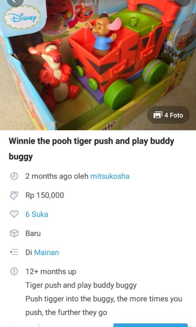 TOMY - Push and play tiger/winnie the pooh buddy buggy on Carousell