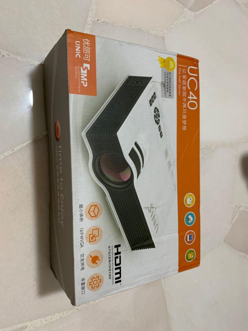 UNIC Family Projector, TV & Home Appliances, TV & Entertainment ...
