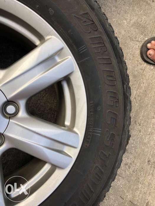 17 Isuzu MUX mags 6Holes pcd 139 with 255 65 R17 Bridgestone used tires ...