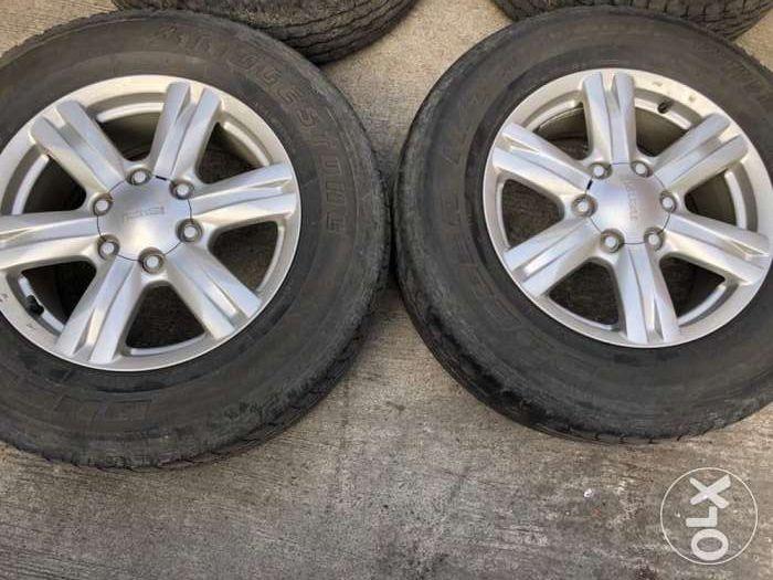 17 Isuzu MUX mags 6Holes pcd 139 with 255 65 R17 Bridgestone used tires ...