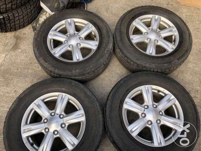 17 Isuzu MUX mags 6Holes pcd 139 with 255 65 R17 Bridgestone used tires ...