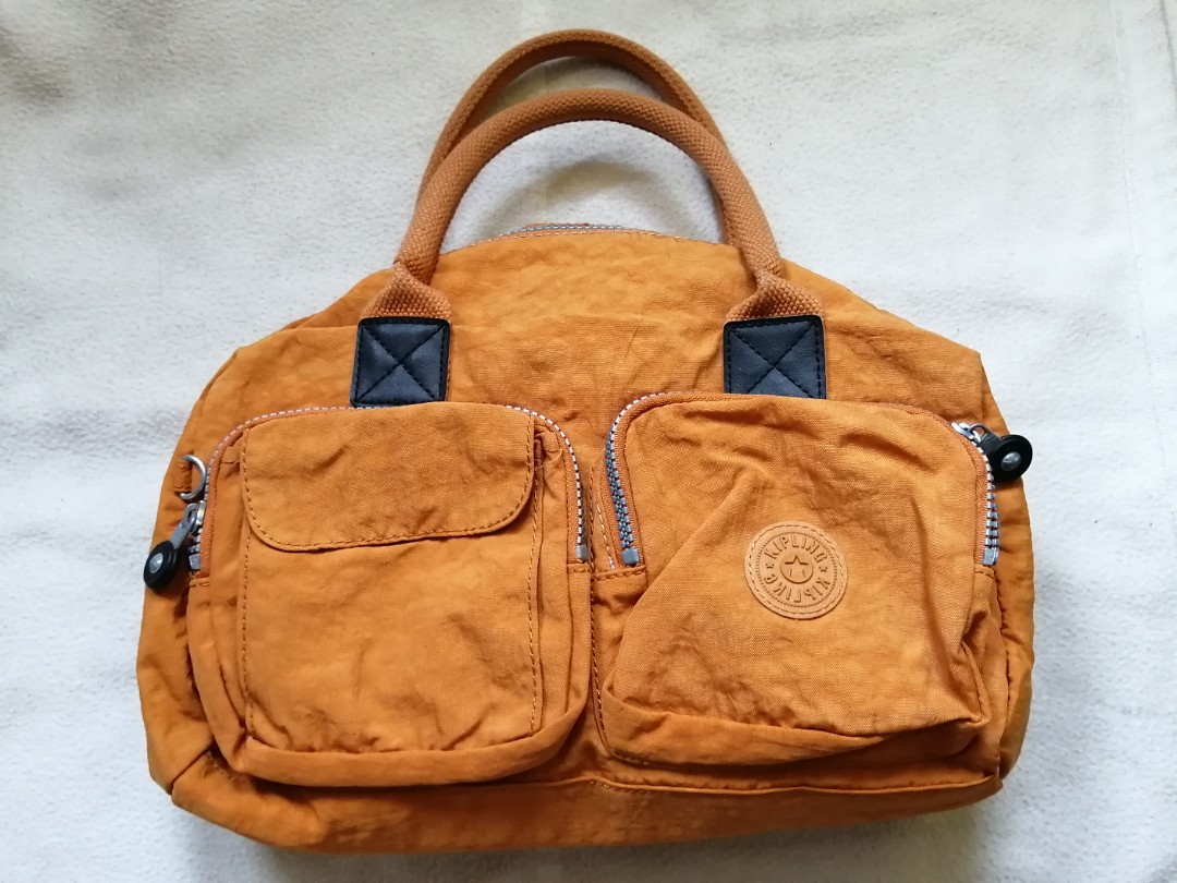Kipling handbag orange, Luxury, Bags & Wallets on Carousell
