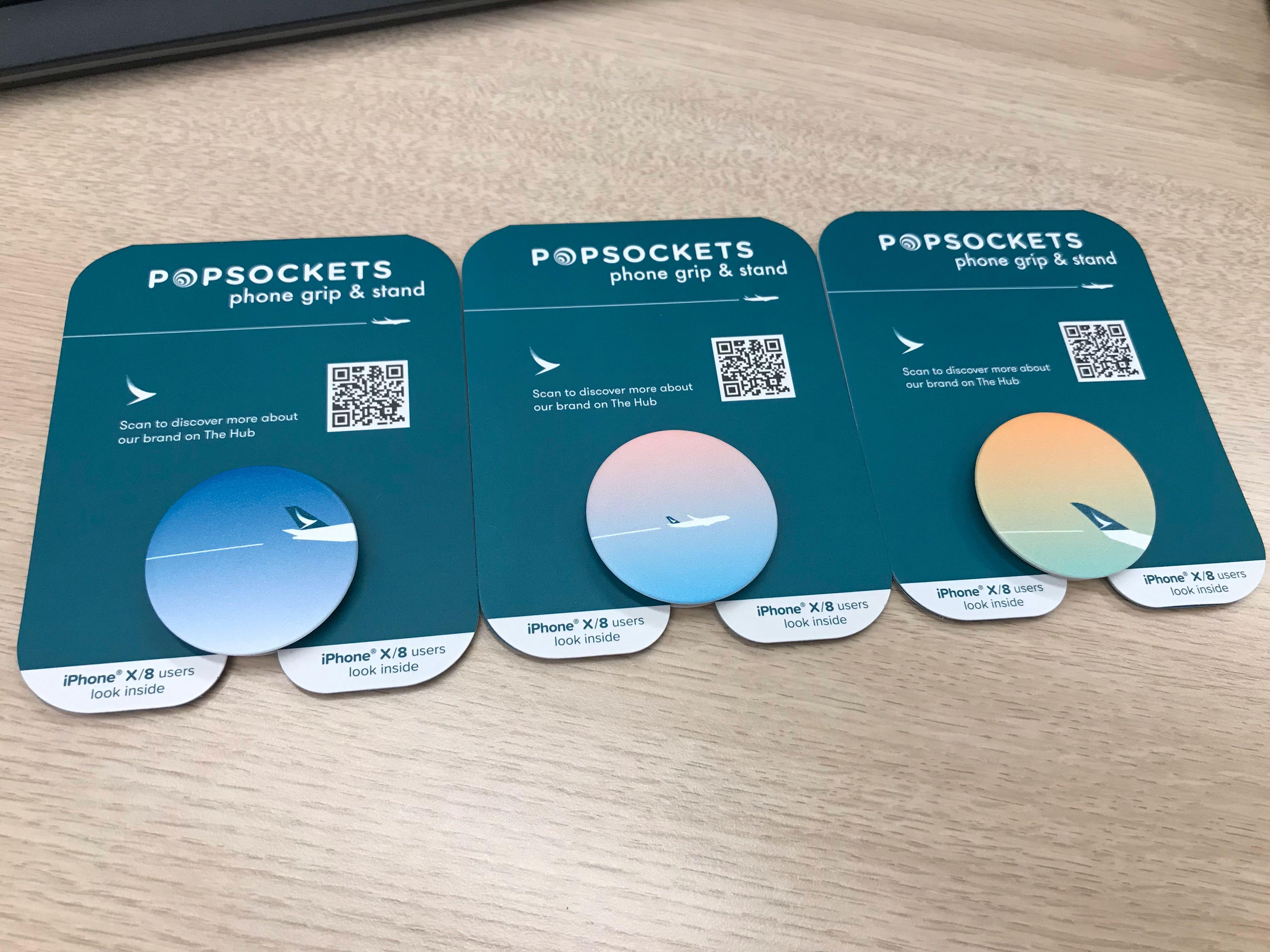 國泰航空限量版手機架/耳機繞線器 Cathay Pacific CX pop socket, 手提電話, 電話及其他裝置配件, 固定器及支架 ...