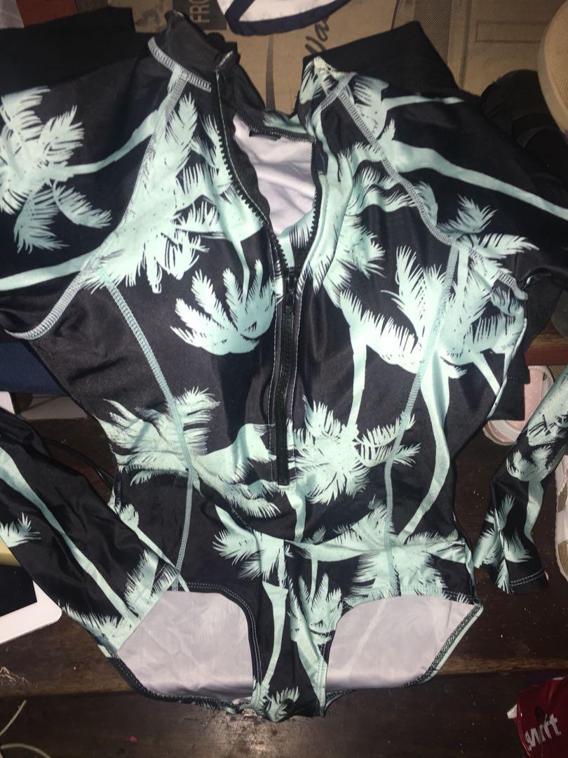 Rash guard (one piece), Women's Fashion, Swimwear, Rash guard on Carousell