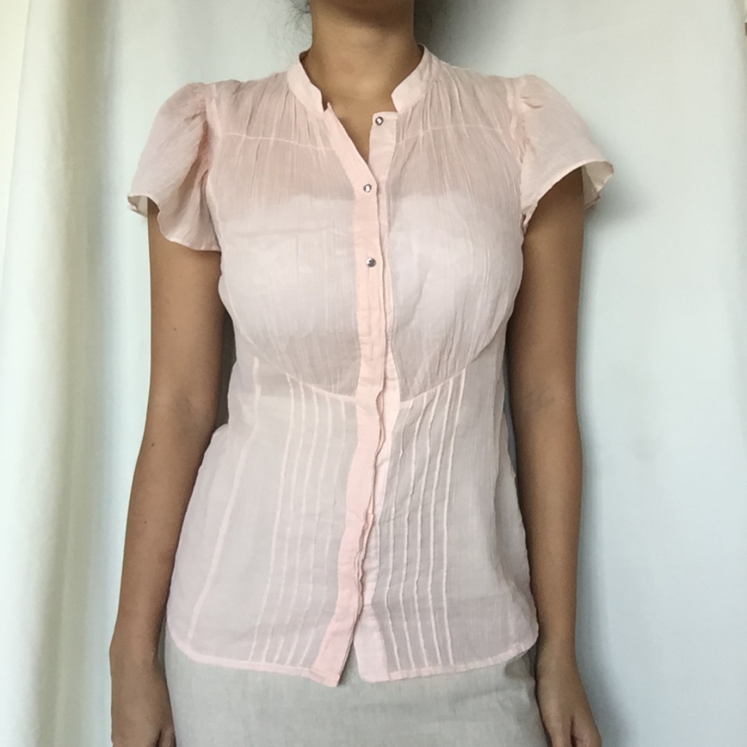Light pink sheer frilly top, Women's Fashion, Tops, Sleeveless on Carousell