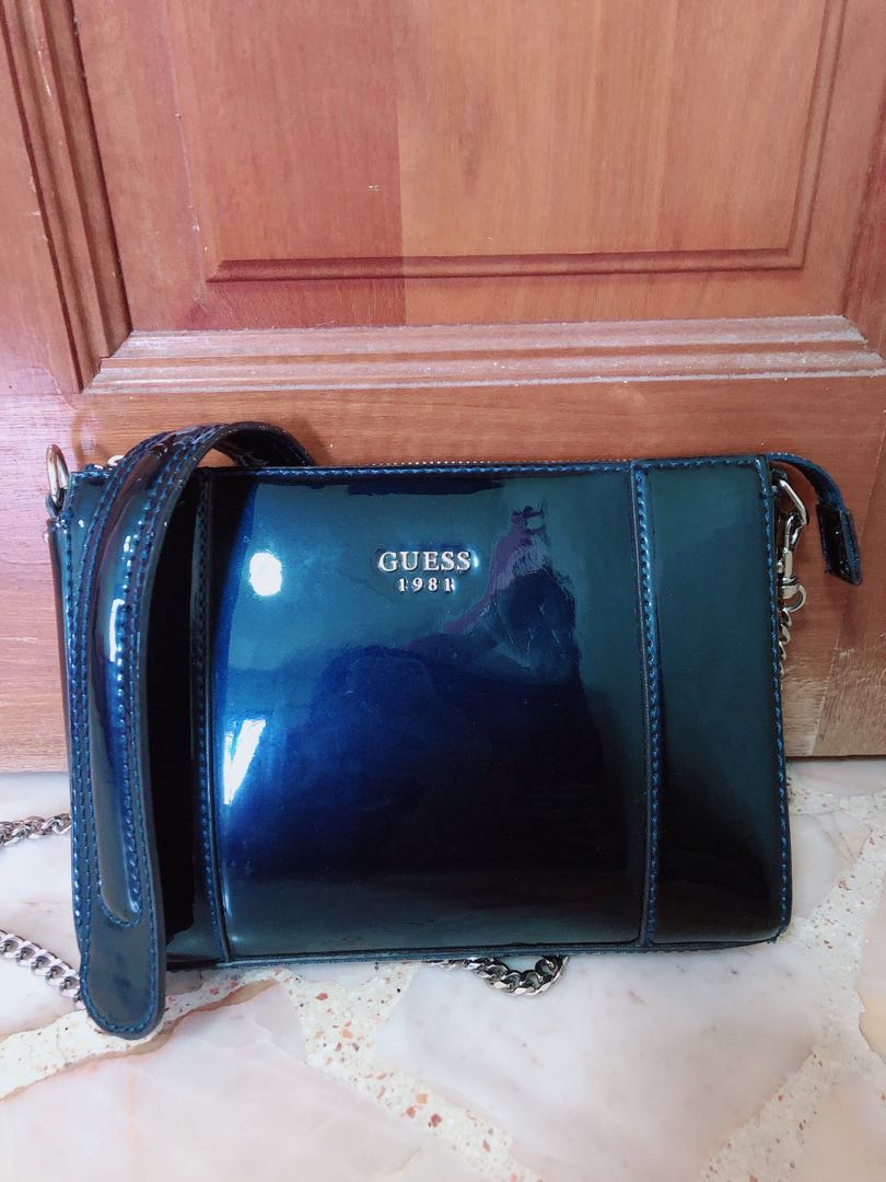 Guess 1981 Sling Bag, Luxury, Bags & Wallets on Carousell