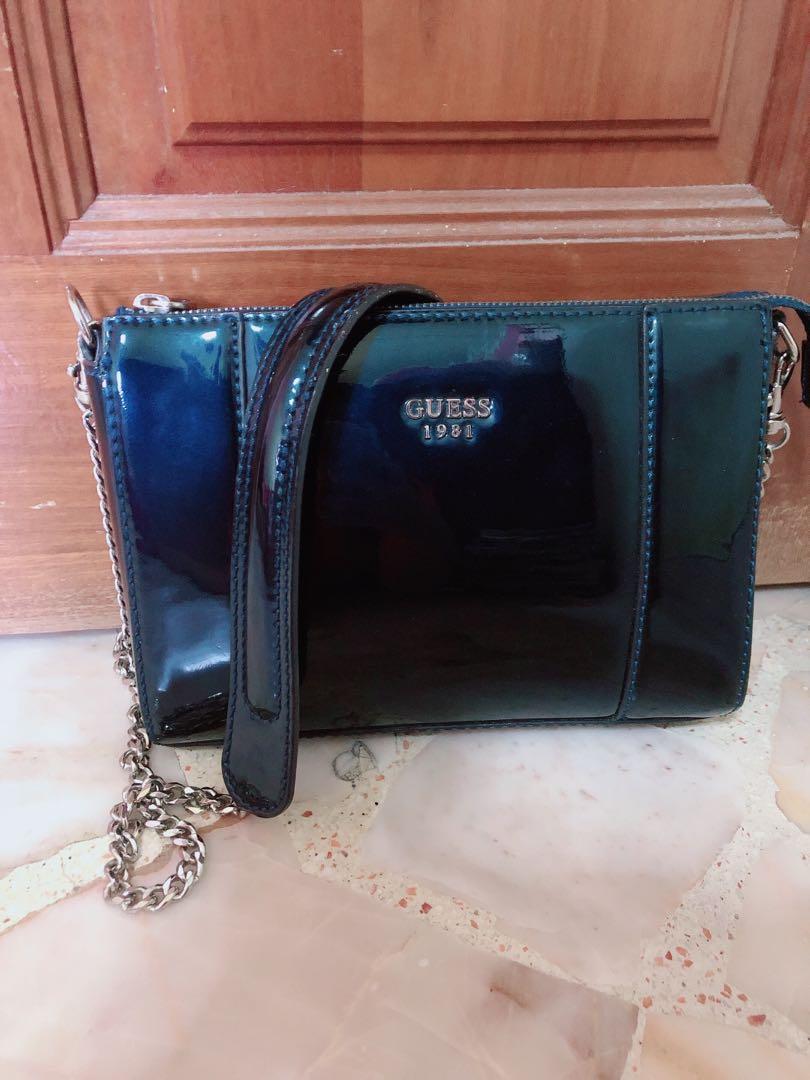 Guess 1981 Sling Bag, Luxury, Bags & Wallets on Carousell