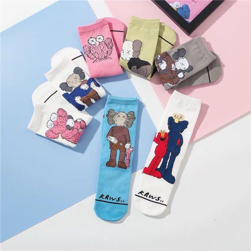 KAWS ICONIC SOCKS, Men's Fashion, Watches & Accessories, Socks on Carousell