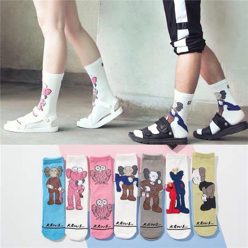 KAWS ICONIC SOCKS, Men's Fashion, Watches & Accessories, Socks on Carousell