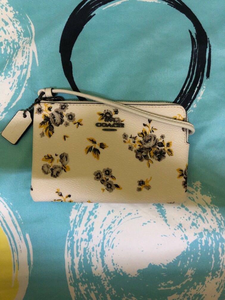 Coach small wristlets, Luxury, Bags & Wallets on Carousell
