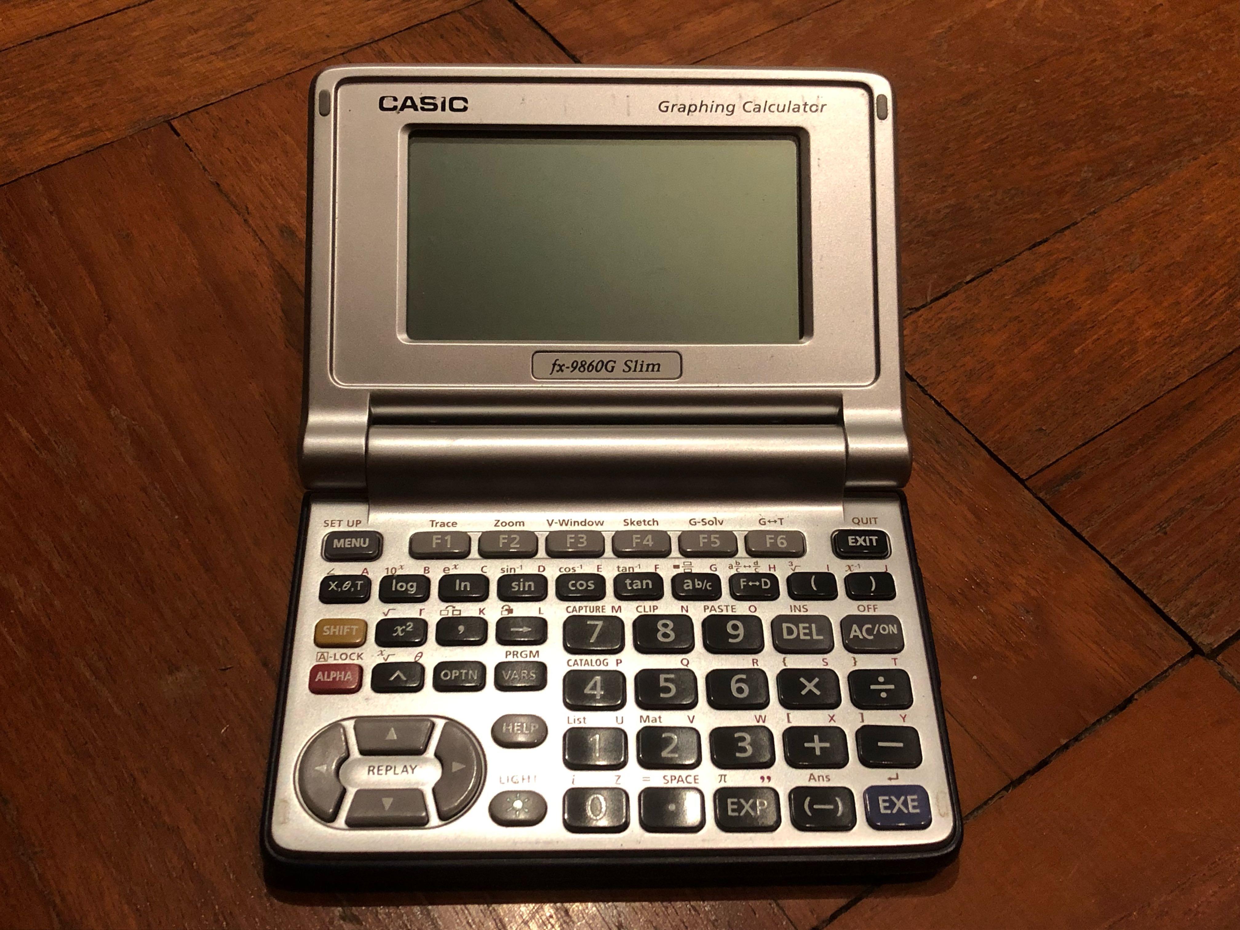 Graphing Calculator : Casio fx-9860G Slim, Hobbies & Toys, Stationery ...