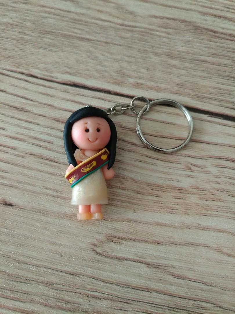 Keychain - Iska: UP graduate with sablay, Hobbies & Toys, Stationary ...