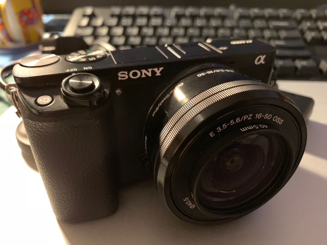 Sony A6000 + kit lens + 5 battery, Photography, Cameras on Carousell