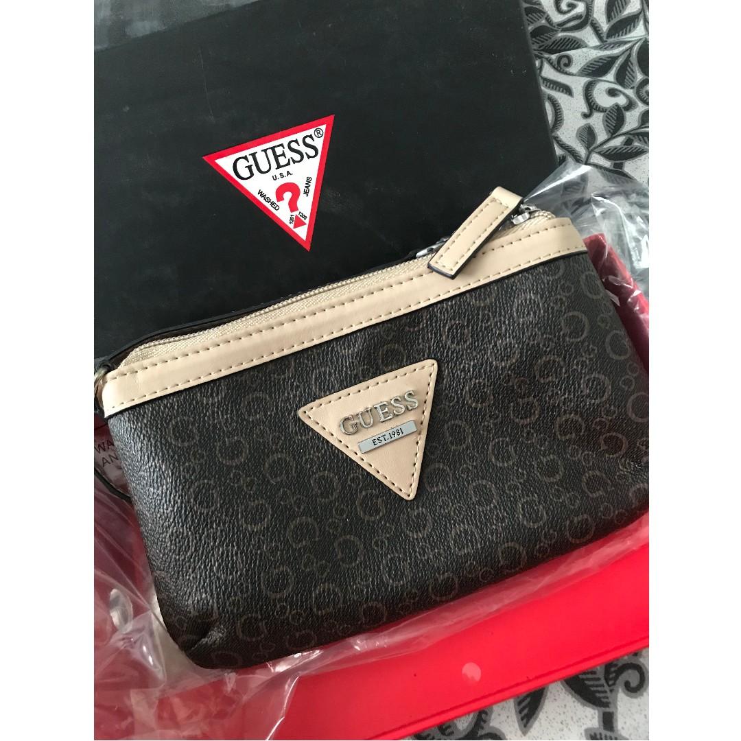 Guess Classic Pouch, Women's Fashion, Bags & Wallets, Purses & Pouches ...