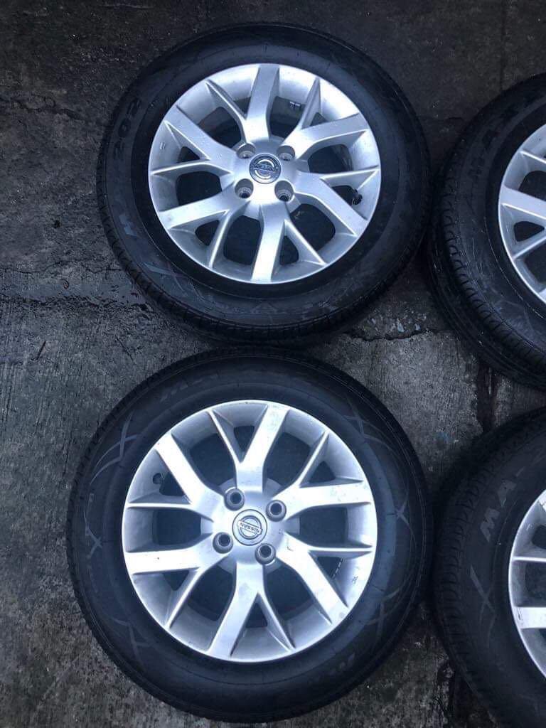 15" Nissan Mags used 4Holes pcd 100 with 185-65-15 Maxxis thick tires ...