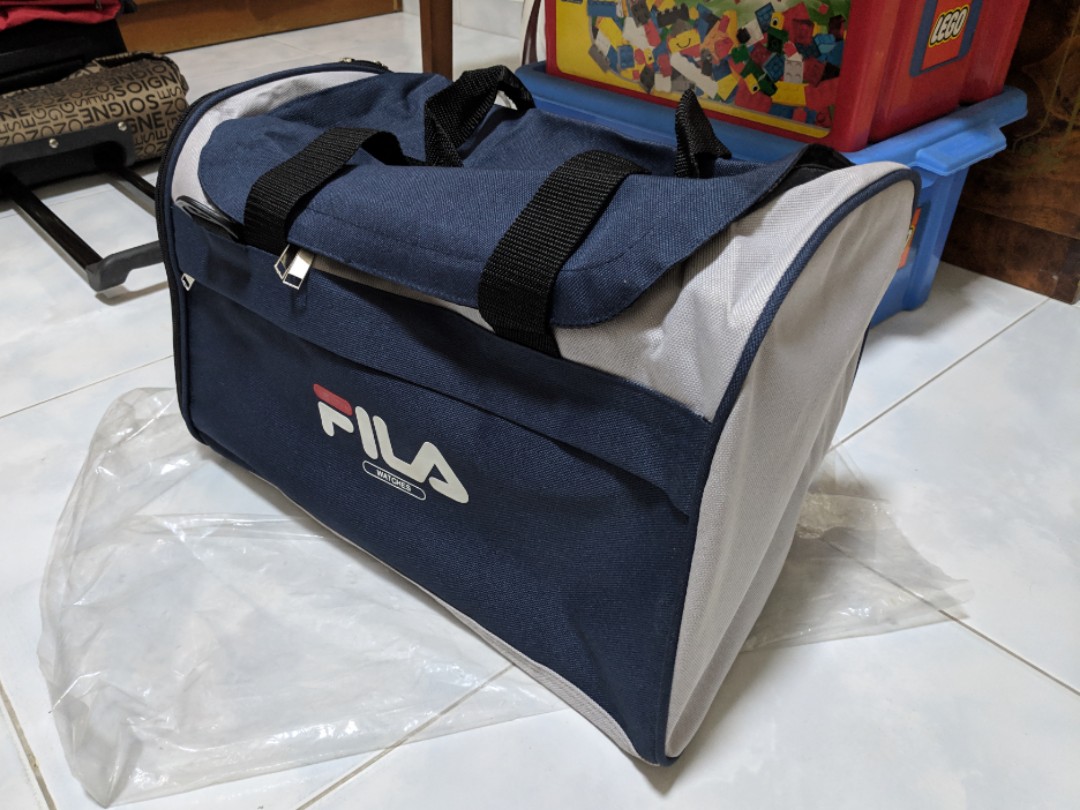 FILA sports duffel bag, Men's Fashion, Bags, Belt bags, Clutches and ...