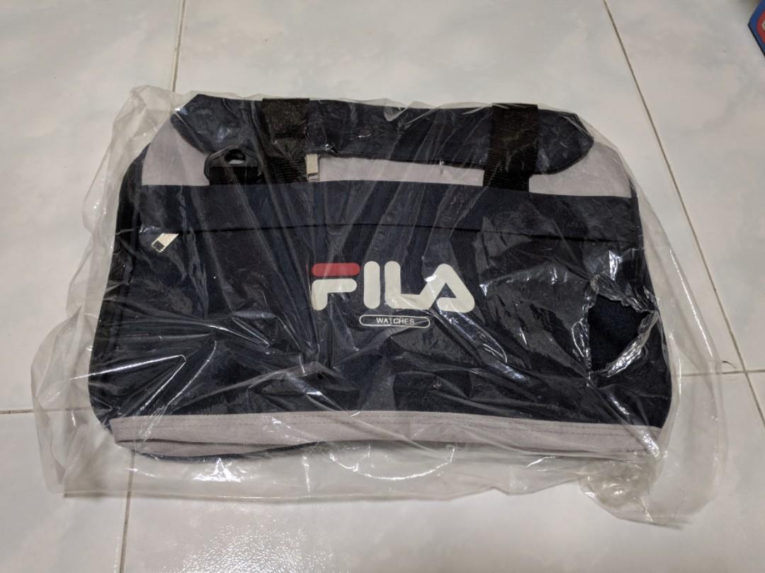 FILA sports duffel bag, Men's Fashion, Bags, Belt bags, Clutches and ...