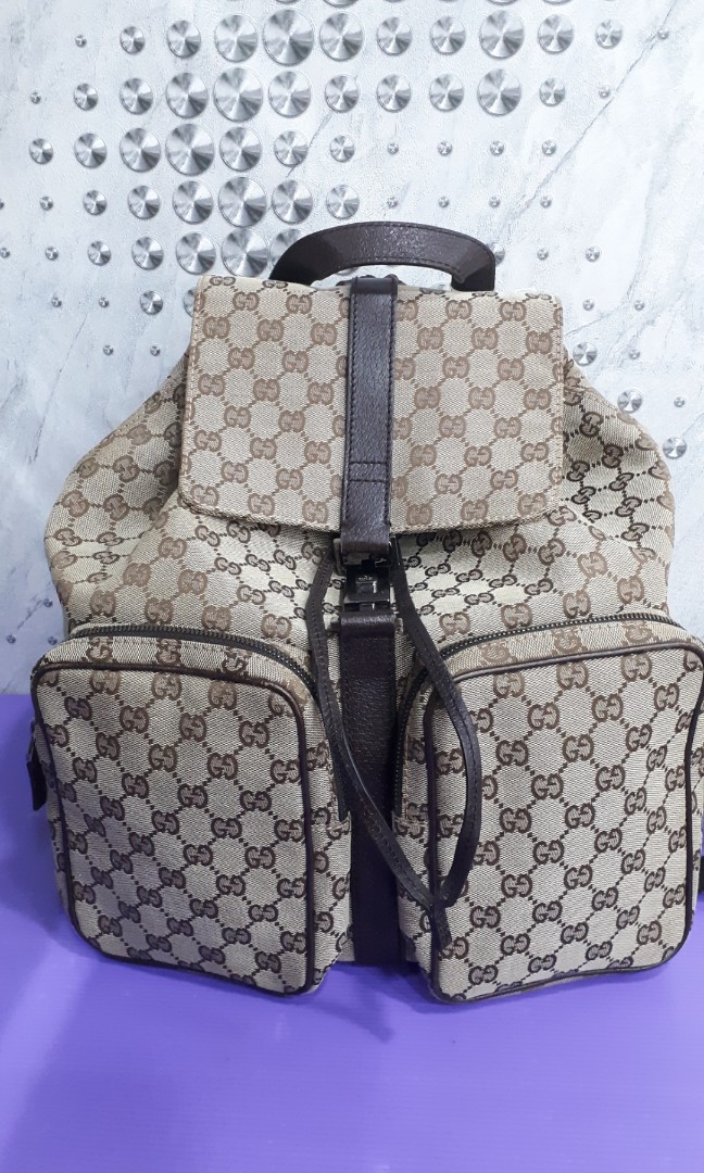 GUCCI LOGO BACKPACK, Luxury, Bags & Wallets on Carousell