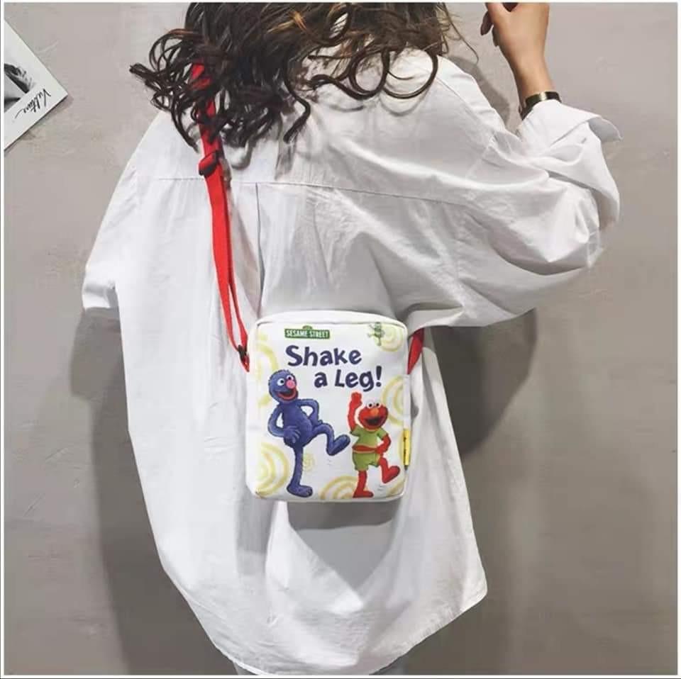 Sesame Street x Kaws sling bag, Women's Fashion, Bags & Wallets, Cross ...