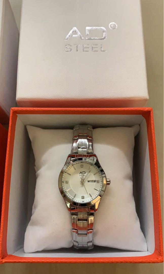Brand new AD Steel couple watch set, Luxury, Watches on Carousell