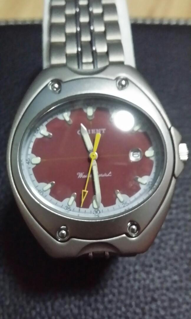 Orient Maroon dial fully Titanium quatz, Mobile Phones & Gadgets ...