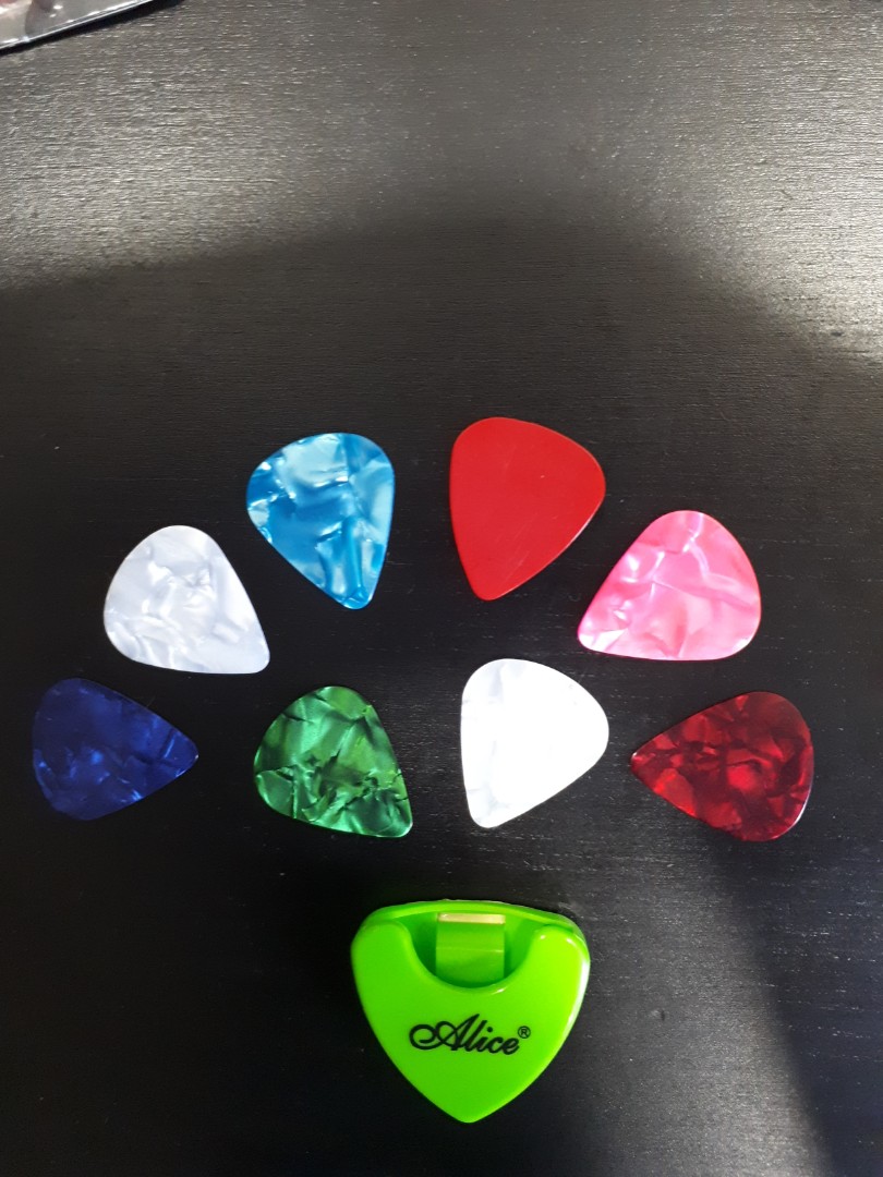 Guitar Picks + holder, Hobbies & Toys, Music & Media, Music Accessories on Carousell