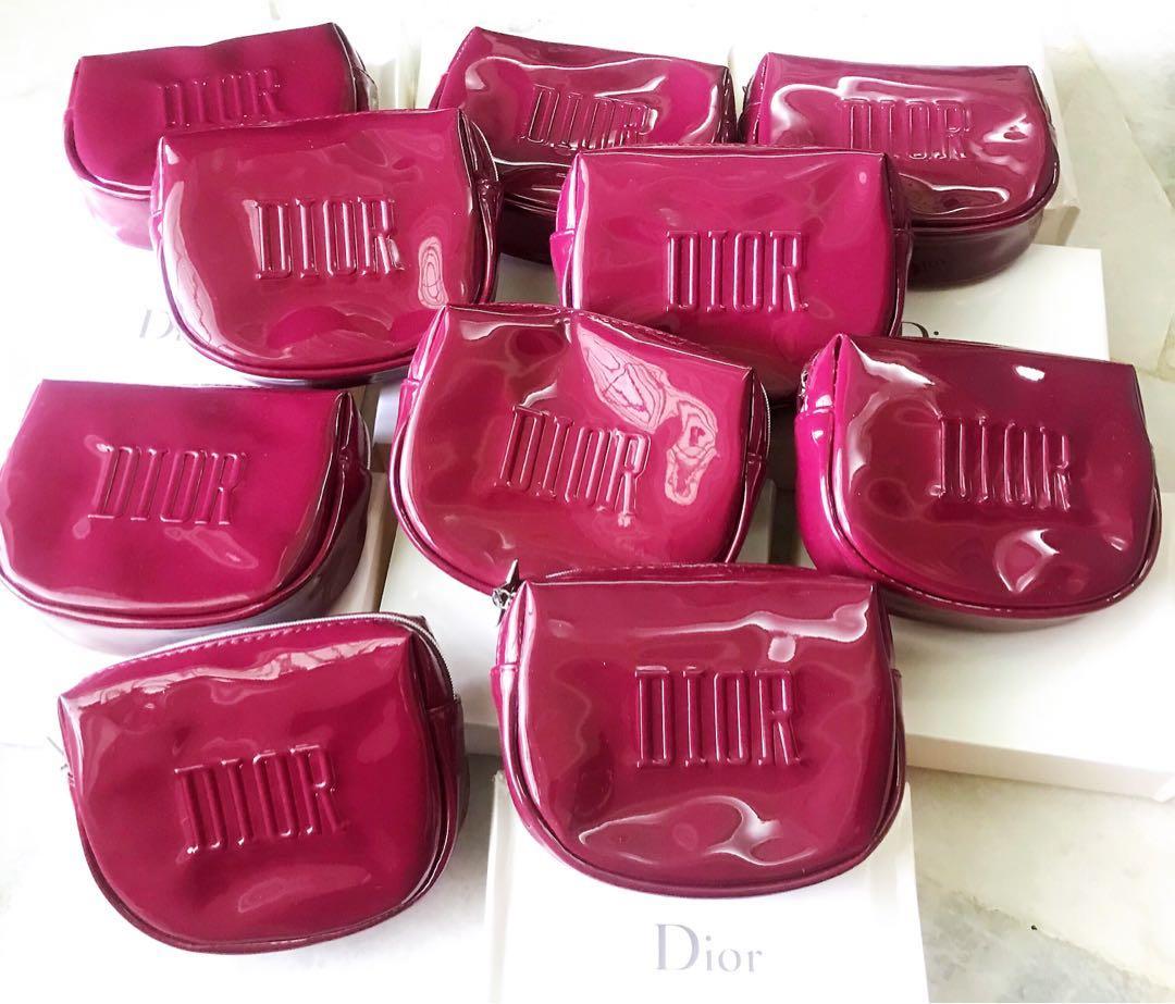 Dior beauty maroon pouch, Luxury, Bags & Wallets on Carousell