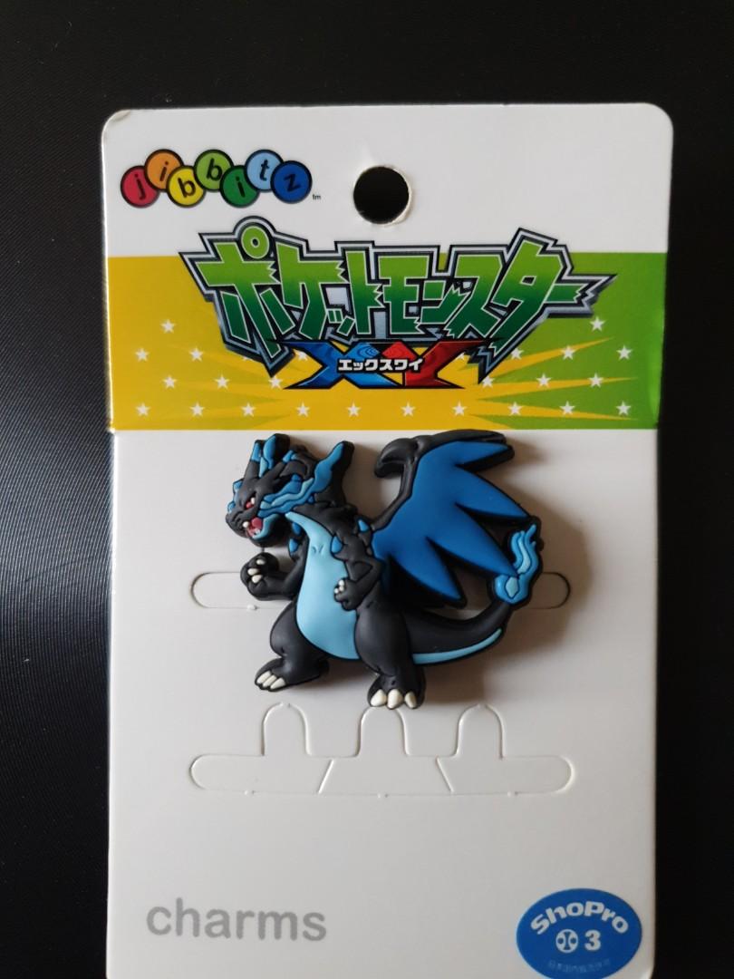 Crocs charms Mega Charizard X, Luxury, Apparel on Carousell