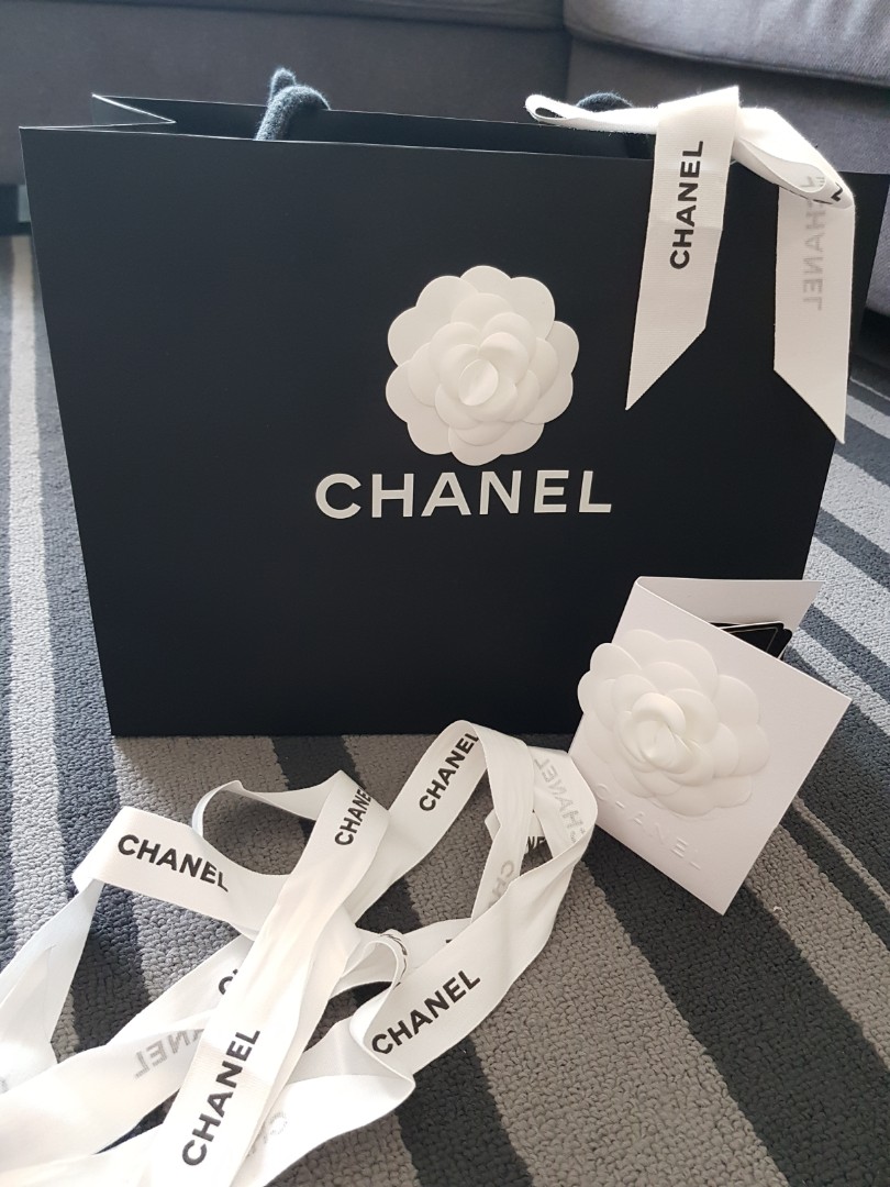 Chanel white flower Paper Bag, Luxury, Bags & Wallets on Carousell