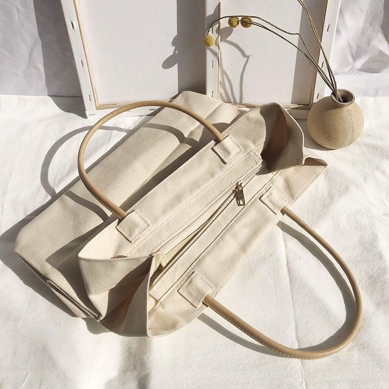 (po) structured canvas tote bag, Women's Fashion, Bags & Wallets, Tote ...