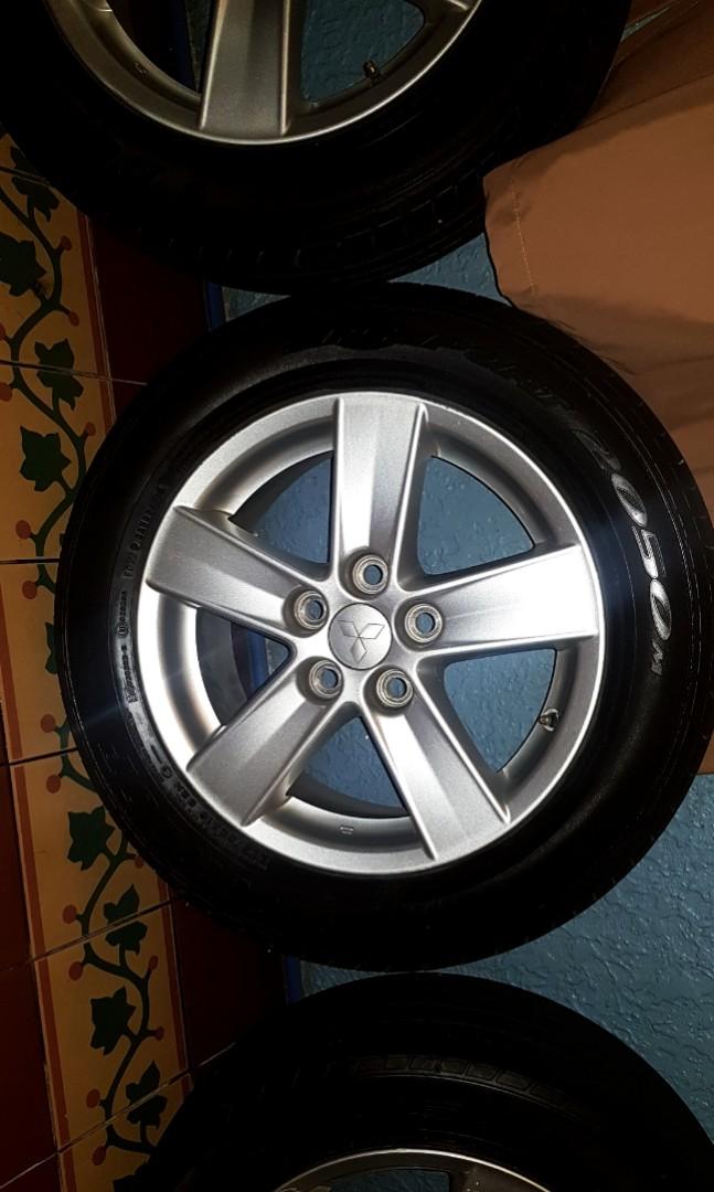 Lancer Ex Stock Rims 16" with 2013 tires, Car Parts & Accessories, Mags ...