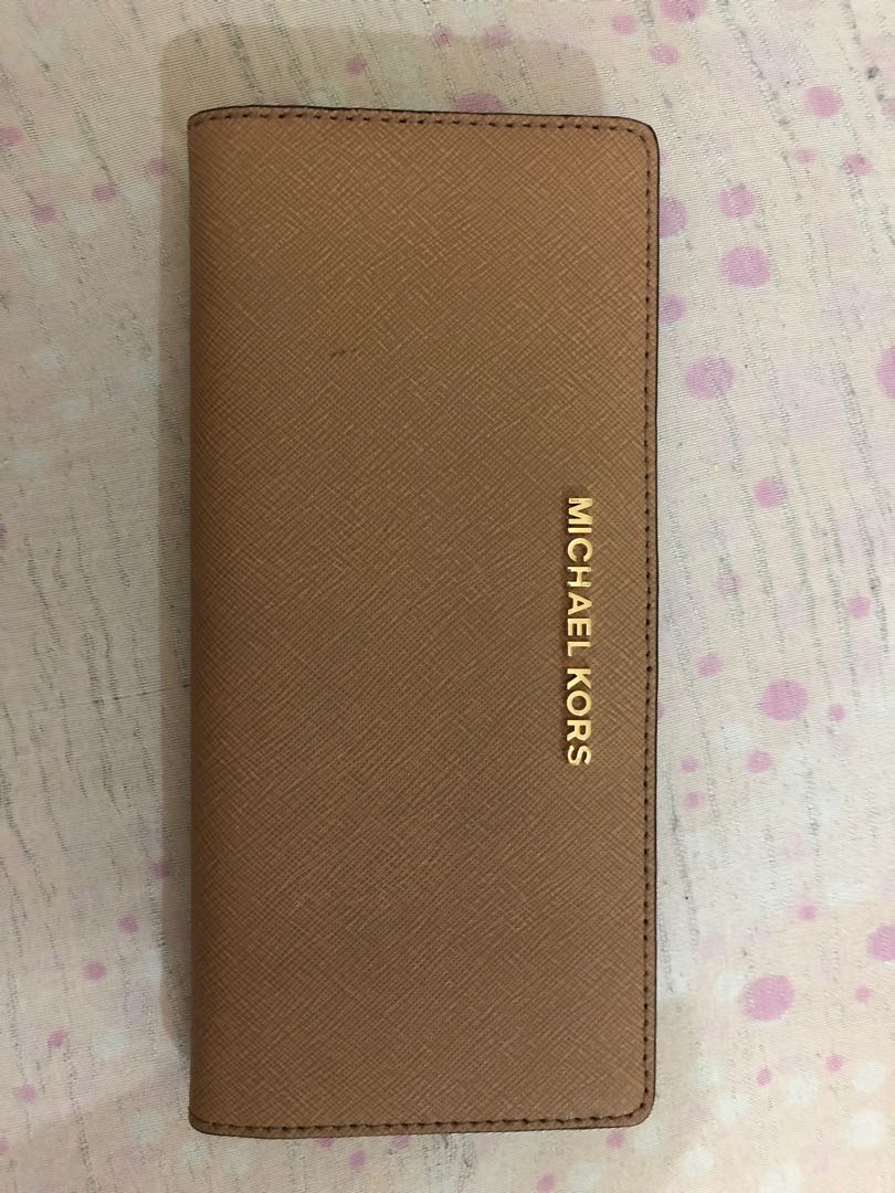 Michael Kors slim wallet, Luxury, Bags & Wallets on Carousell