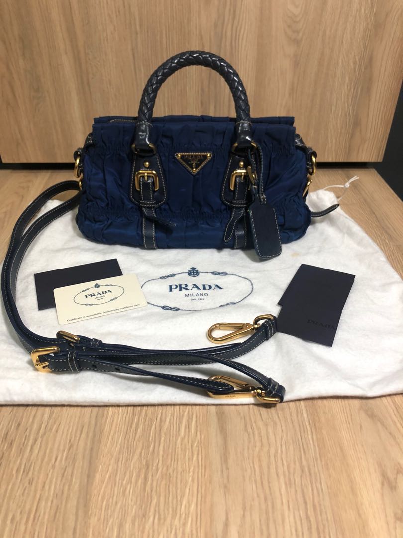 Prada Gaufre Mini Sling, Luxury, Bags & Wallets on Carousell