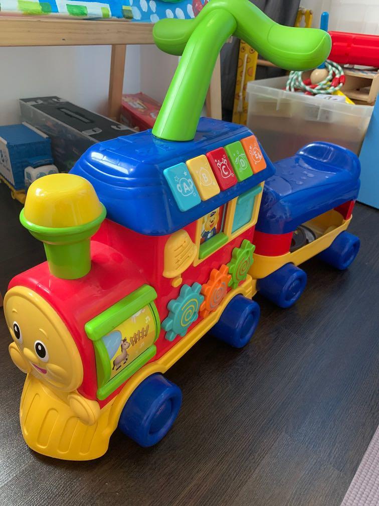 Walker ride on learning train, Babies & Kids, Infant Playtime on Carousell