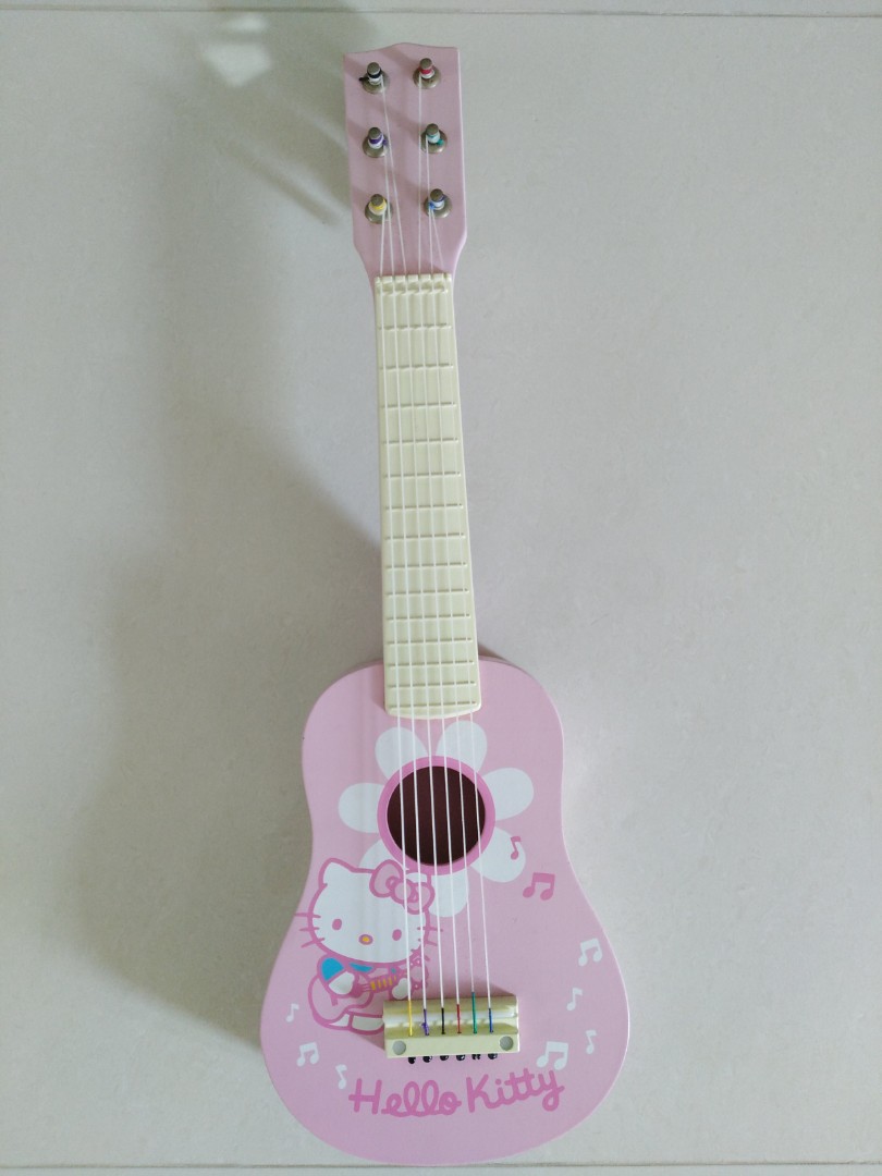 Kid hello kitty guitar (pink), Hobbies & Toys, Music & Media, Musical ...