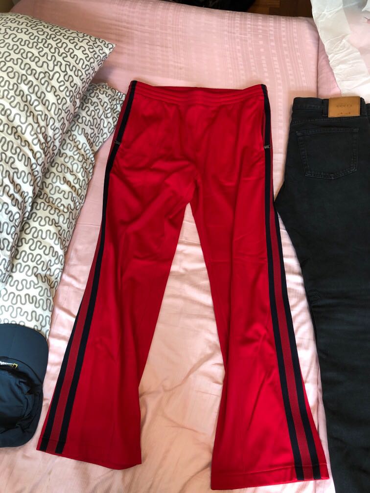 Gucci red flare sweatpants, Men's Fashion, Bottoms, Jeans on Carousell