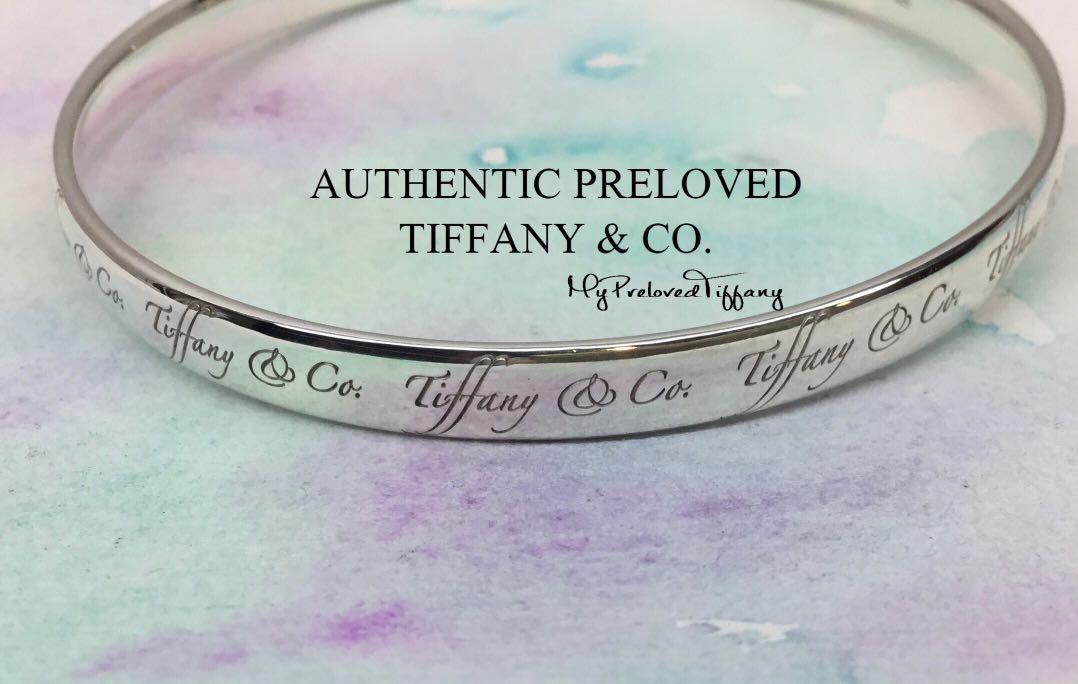 Excellent Authentic Tiffany & Co Logo Script Notes Cursive Bangle ...