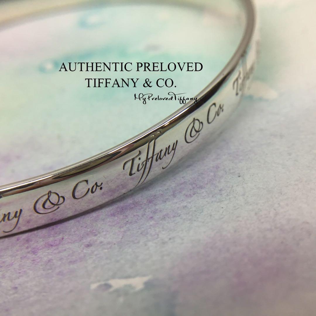 Excellent Authentic Tiffany & Co Logo Script Notes Cursive Bangle ...