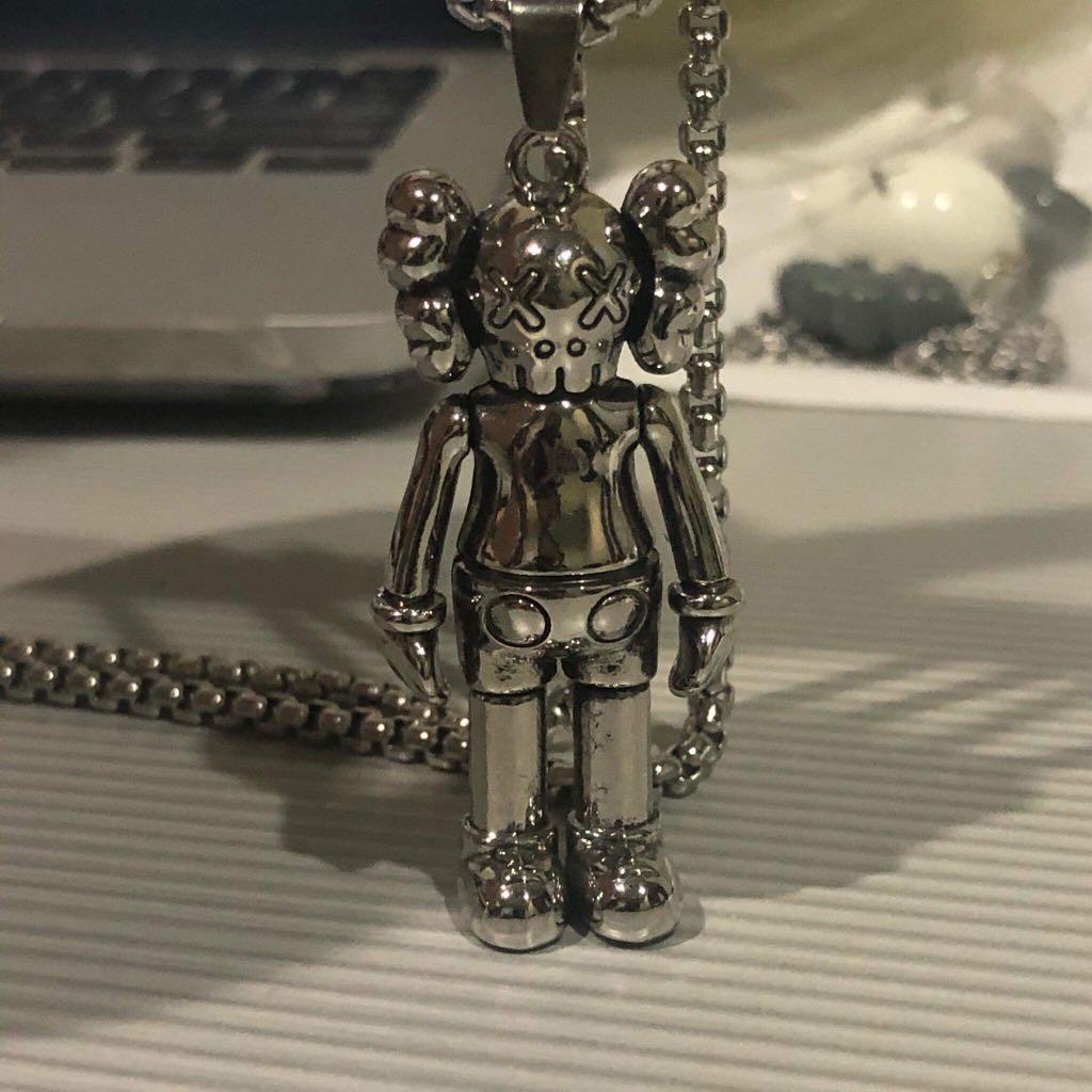 Kaws necklace steel chain, Hobbies & Toys, Toys & Games on Carousell