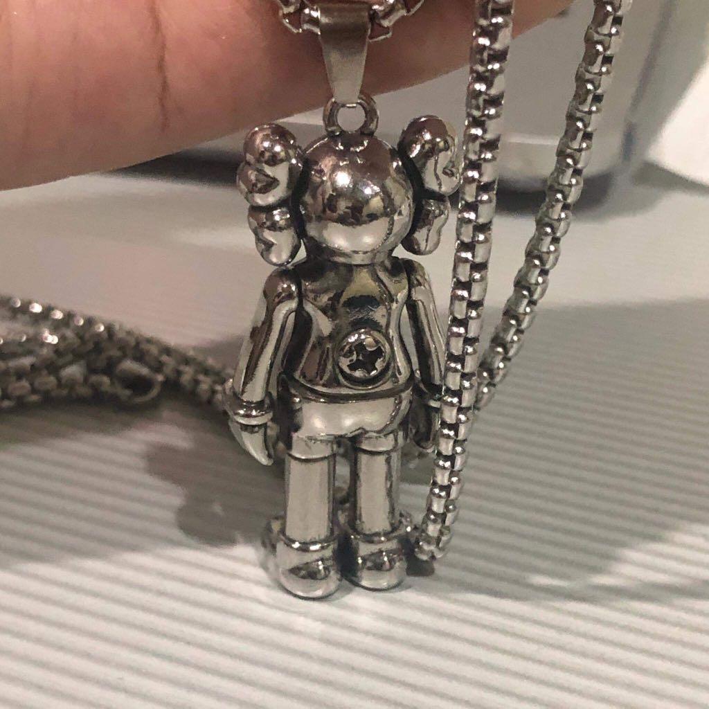 Kaws necklace steel chain, Hobbies & Toys, Toys & Games on Carousell