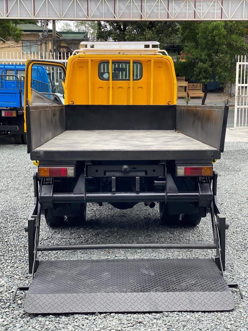 Fuso Canter 10ft. dropside with lifter on Carousell