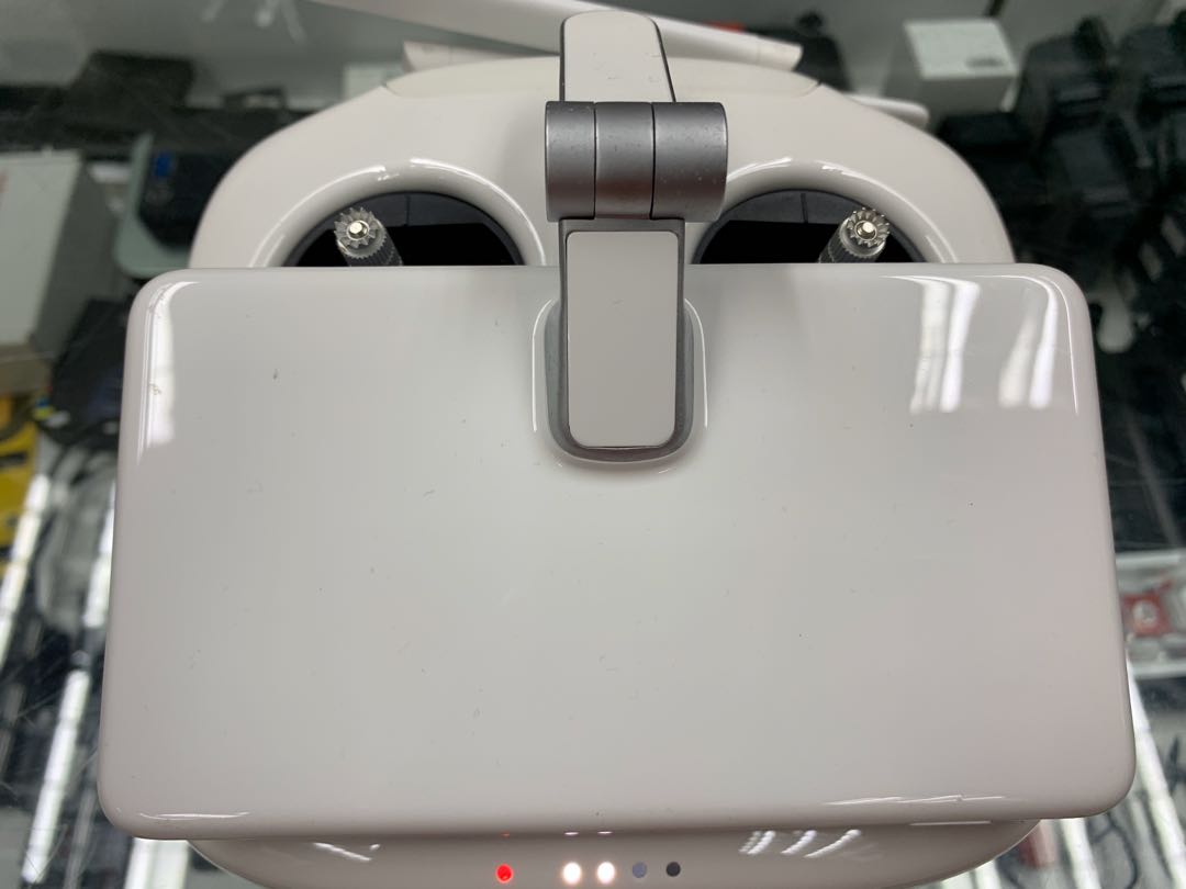 Dji phantom 4 pro v2 remote with screen., Photography, Drones on Carousell