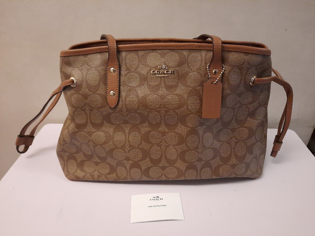 Coach drawstring carryall, Women's Fashion, Bags & Wallets, Purses ...