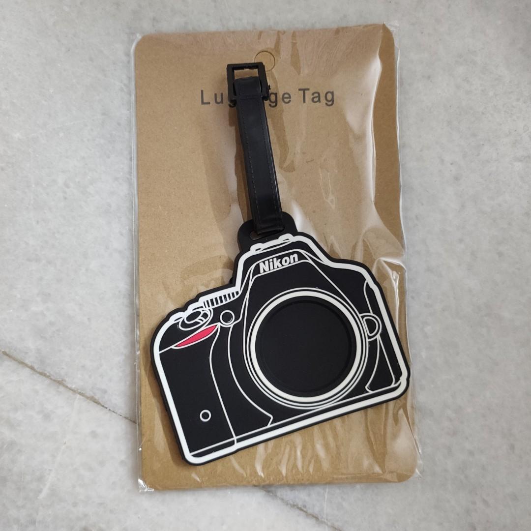 Authentic Nikon luggage tag, Photography, Photography Accessories ...