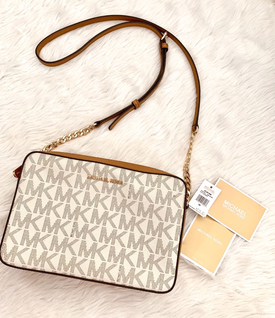 Original Michael Kors sling, Luxury, Bags & Wallets on Carousell