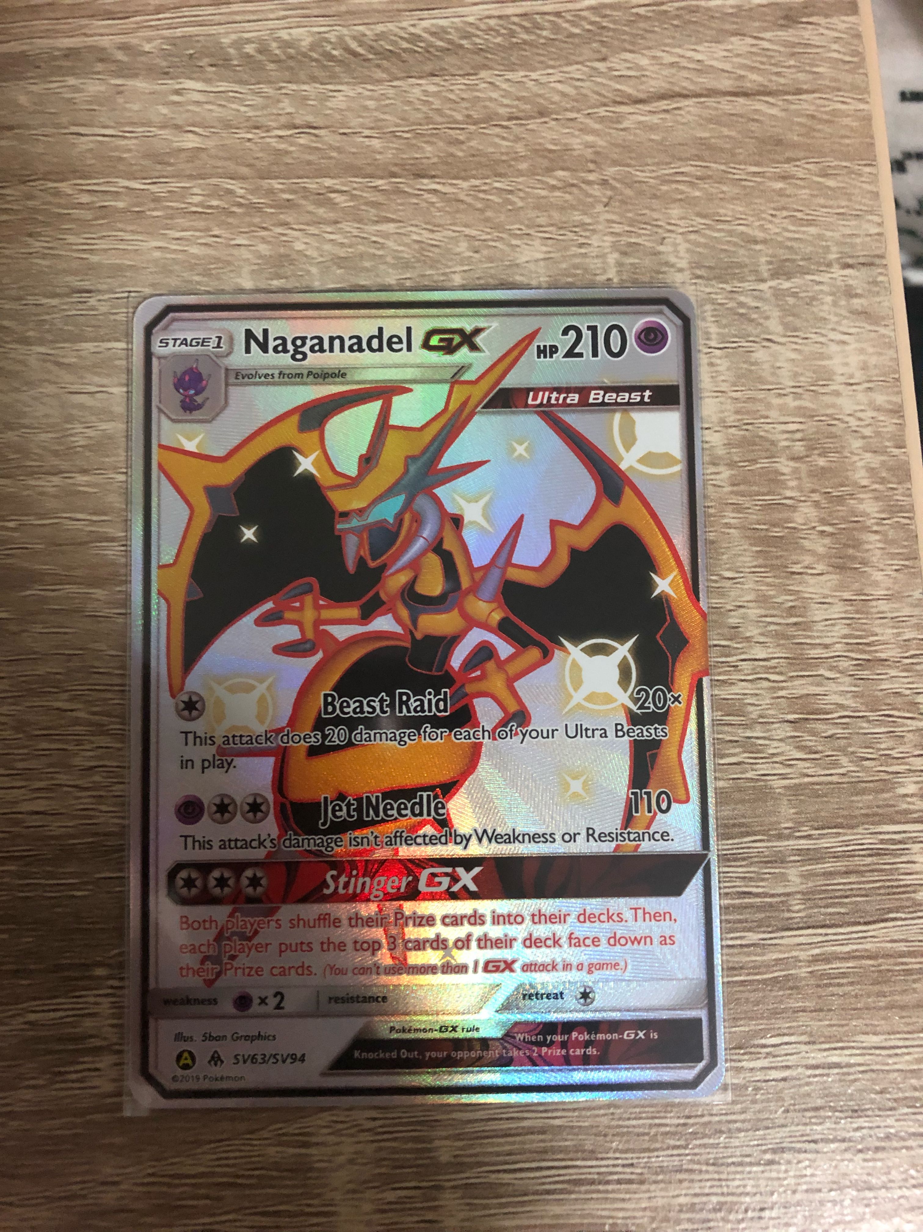 Hidden fates shiny naganadel gx pokemon card, Hobbies & Toys, Toys ...
