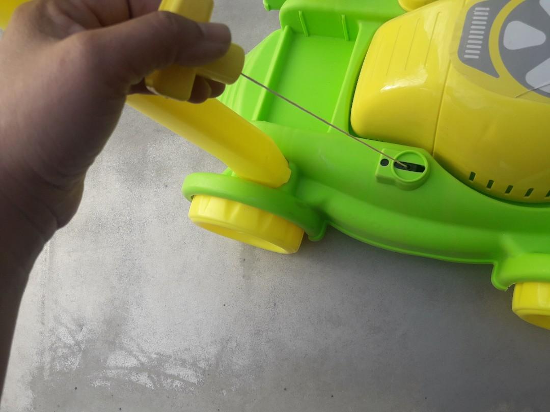Lawn Mower Plastic Toy/walker, Babies & Kids, Infant Playtime on Carousell